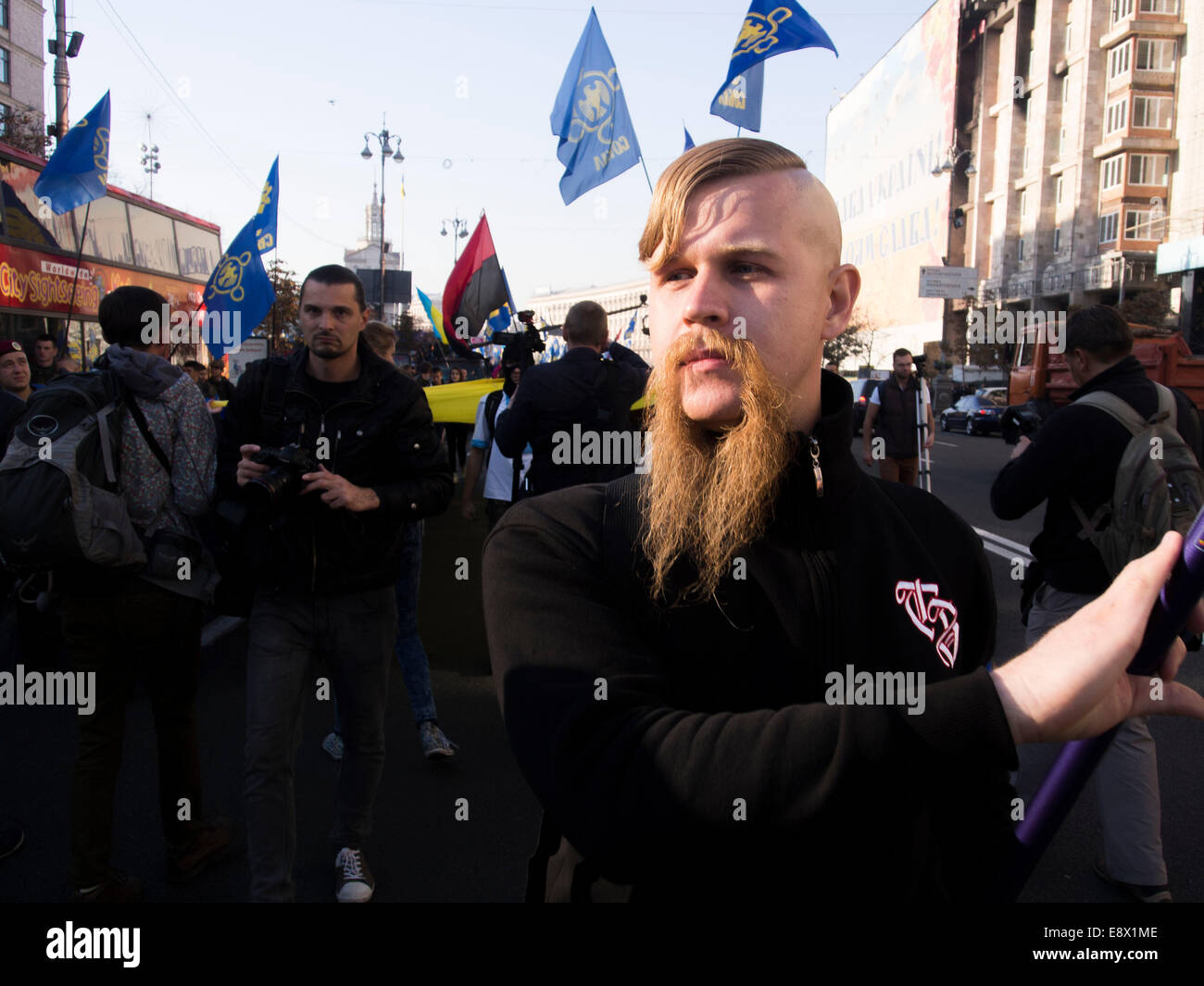Kiev, Ukraine. 14th October, 2014. Member of the rally with a long ...