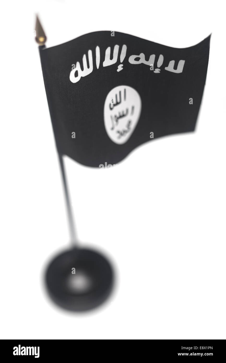 Small flag of ISIL, ISIS in a stand isolated on a white background ...