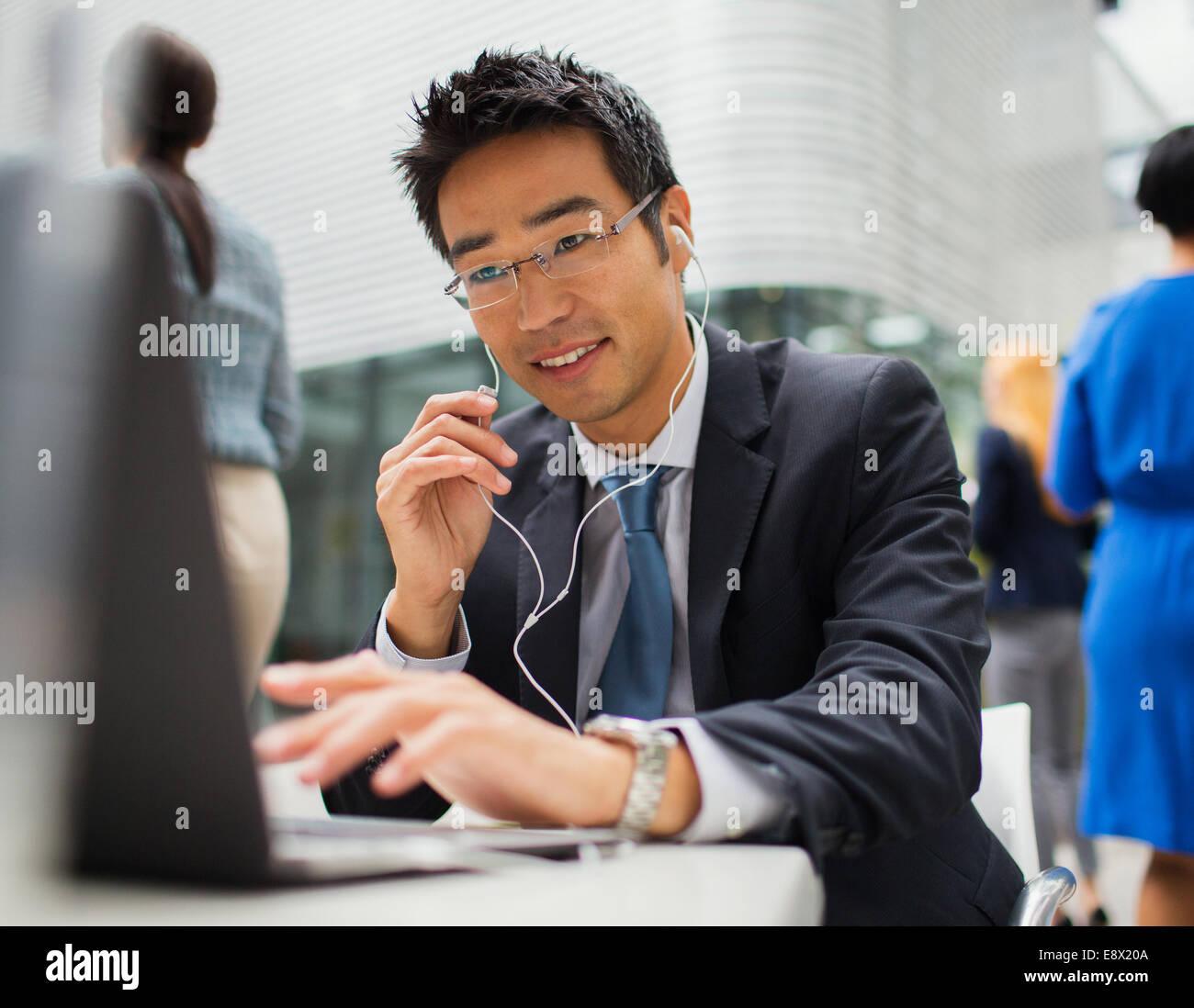 Businessman sitting by table hi-res stock photography and images - Alamy