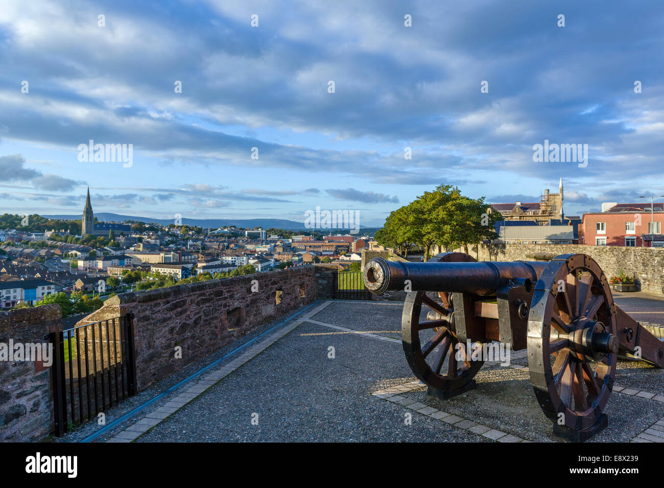 Cannon on the Royal Bastion of Old City Walls with Bogside behind ...