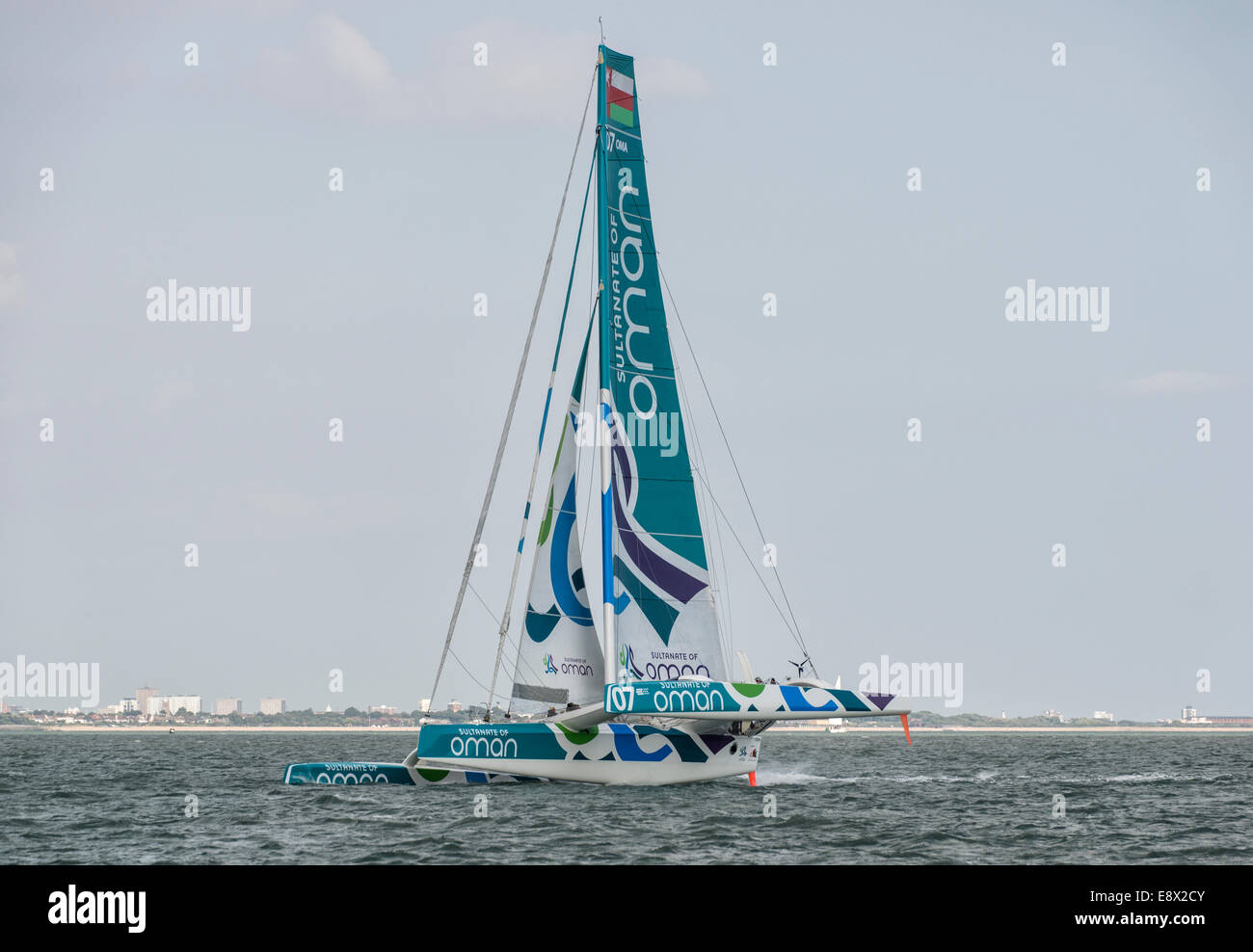 Oman Sail Trimaran Musandam sailing in the Solent during the Cowes Week ...