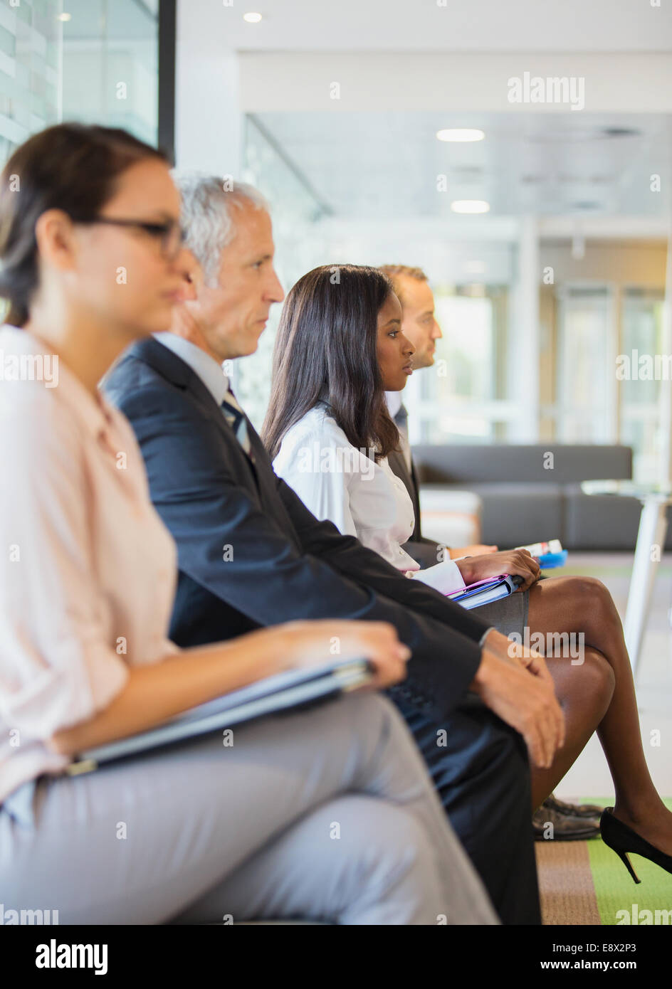 Business people sitting in office together Stock Photo - Alamy