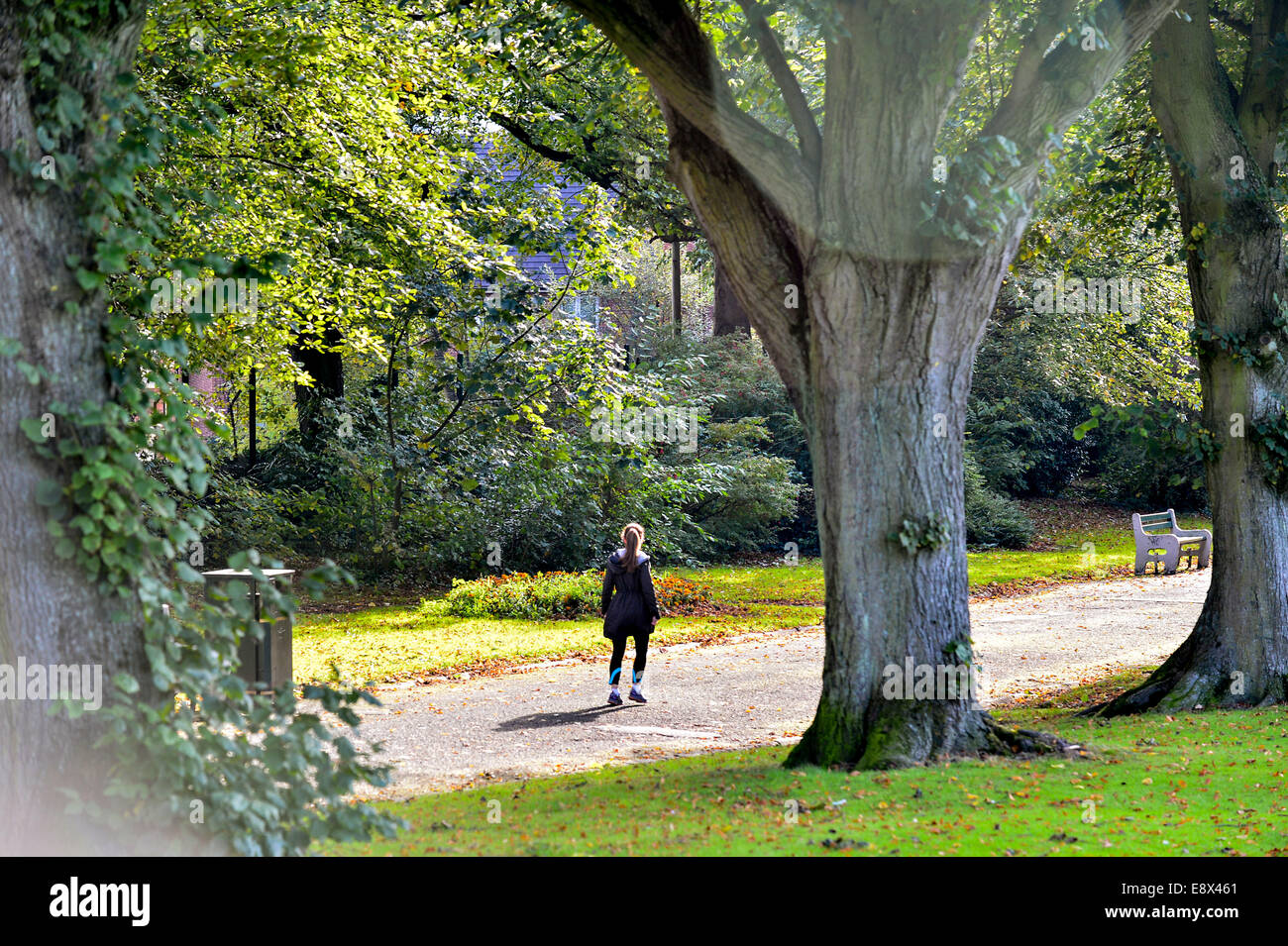 Woman walking alone hi-res stock photography and images - Alamy