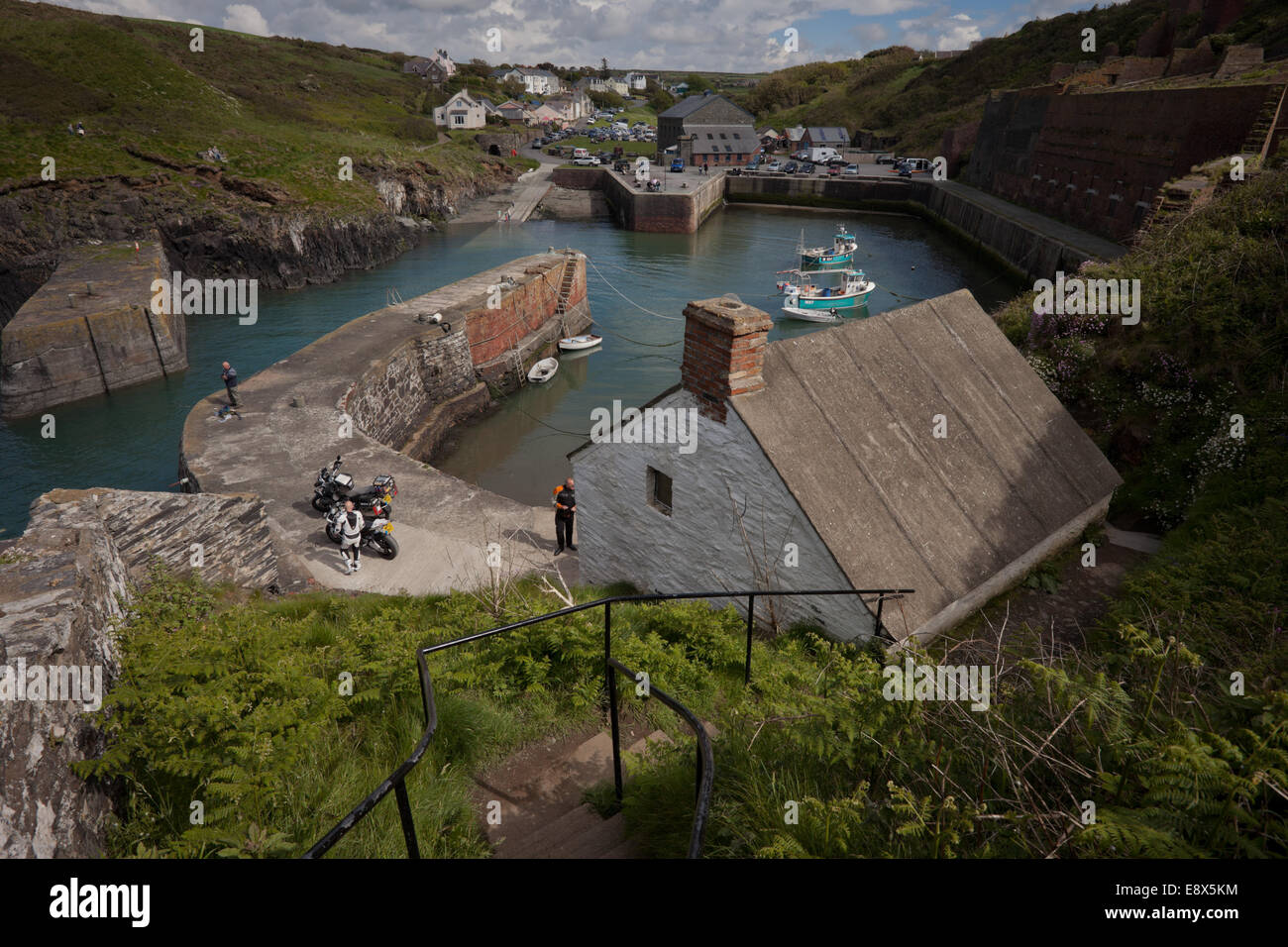 View of Porthgain harbour from the steps of the Pembrokeshire coastal ...