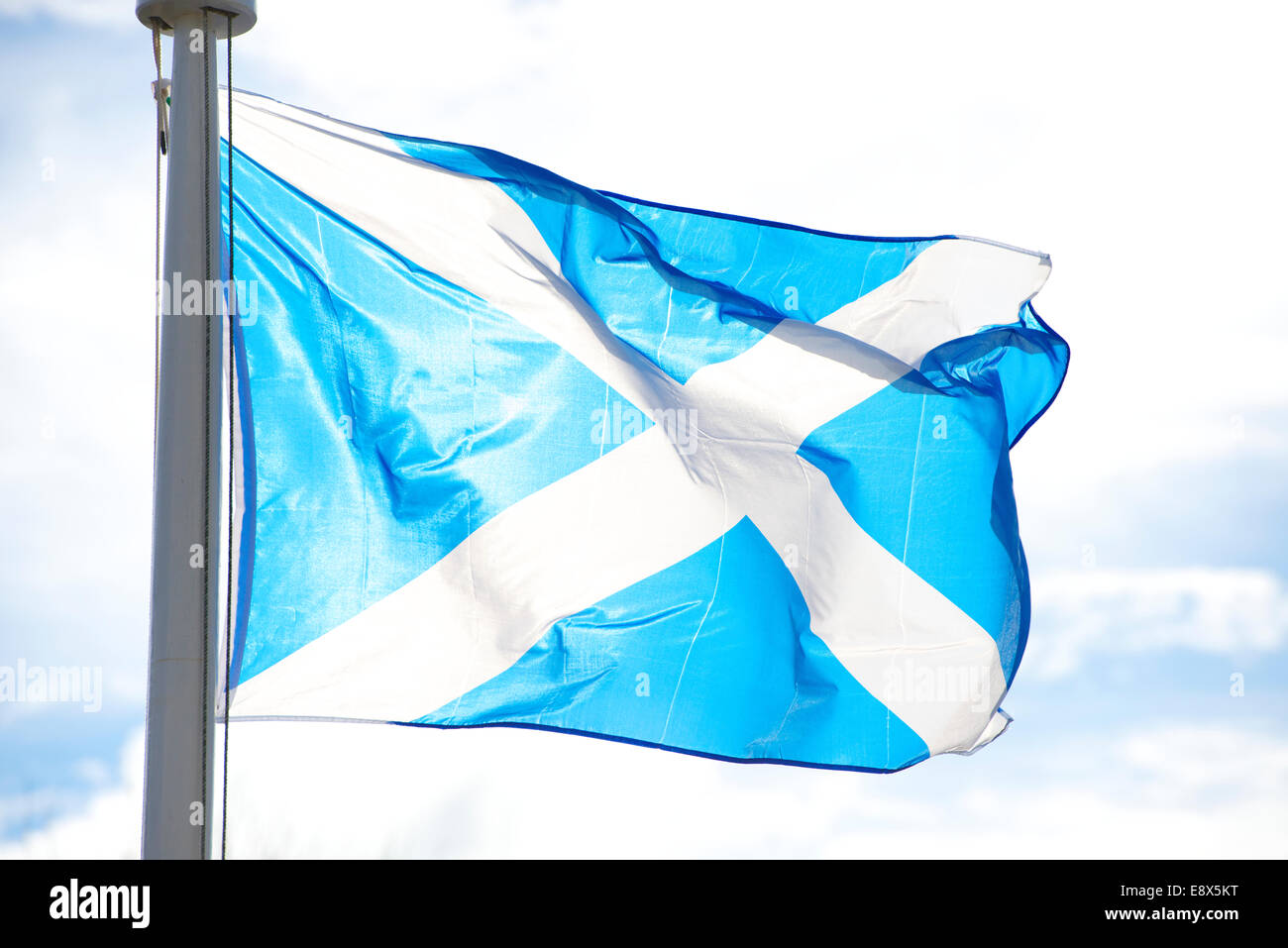 Scottish Saltire flag against a bright sky Stock Photo - Alamy