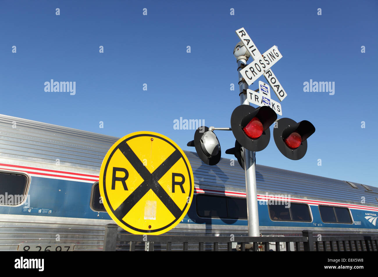 Amtrak train at a crossing sign at Rutland Station in Vermont, USA ...