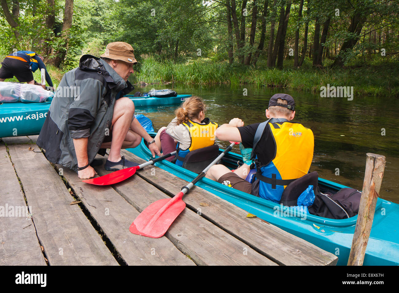 A group of young kayakers. Bystrzyca river Kayaking expedition. Poland ...