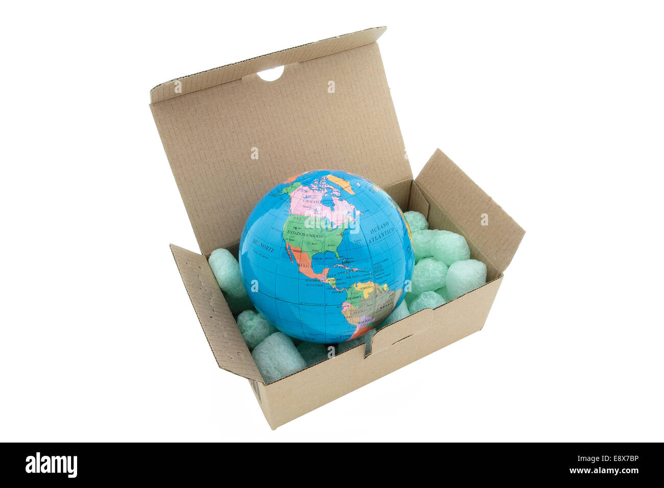 terrestrial globe on a carton box isolated on white background Stock ...