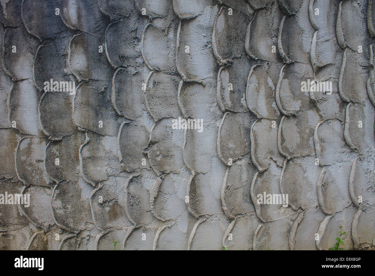 Textured stone wall in gaden at home, Thailand Stock Photo - Alamy