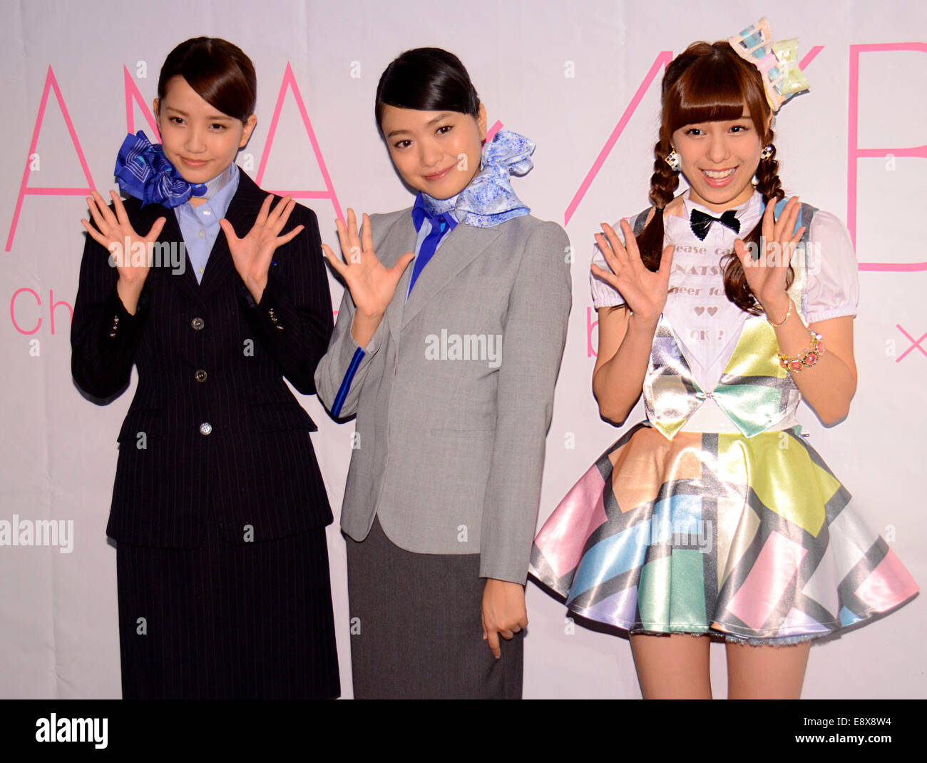 Taipai. 15th October, 2014. Three members of Japanese idol group AKB48 attend the press ...