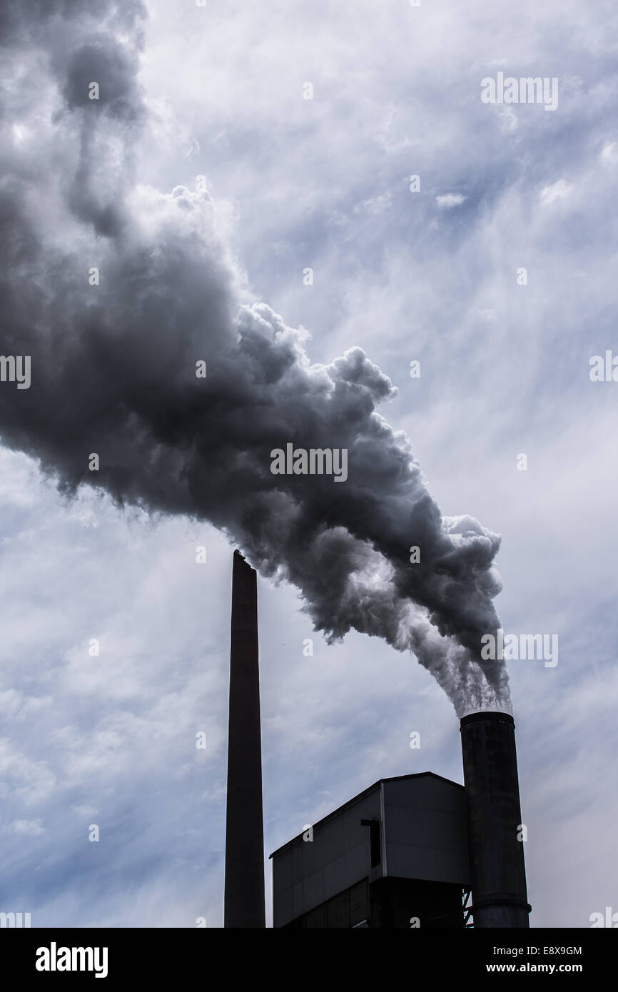 A steel mill in Australia emitting a plume of smoke or steam Stock ...