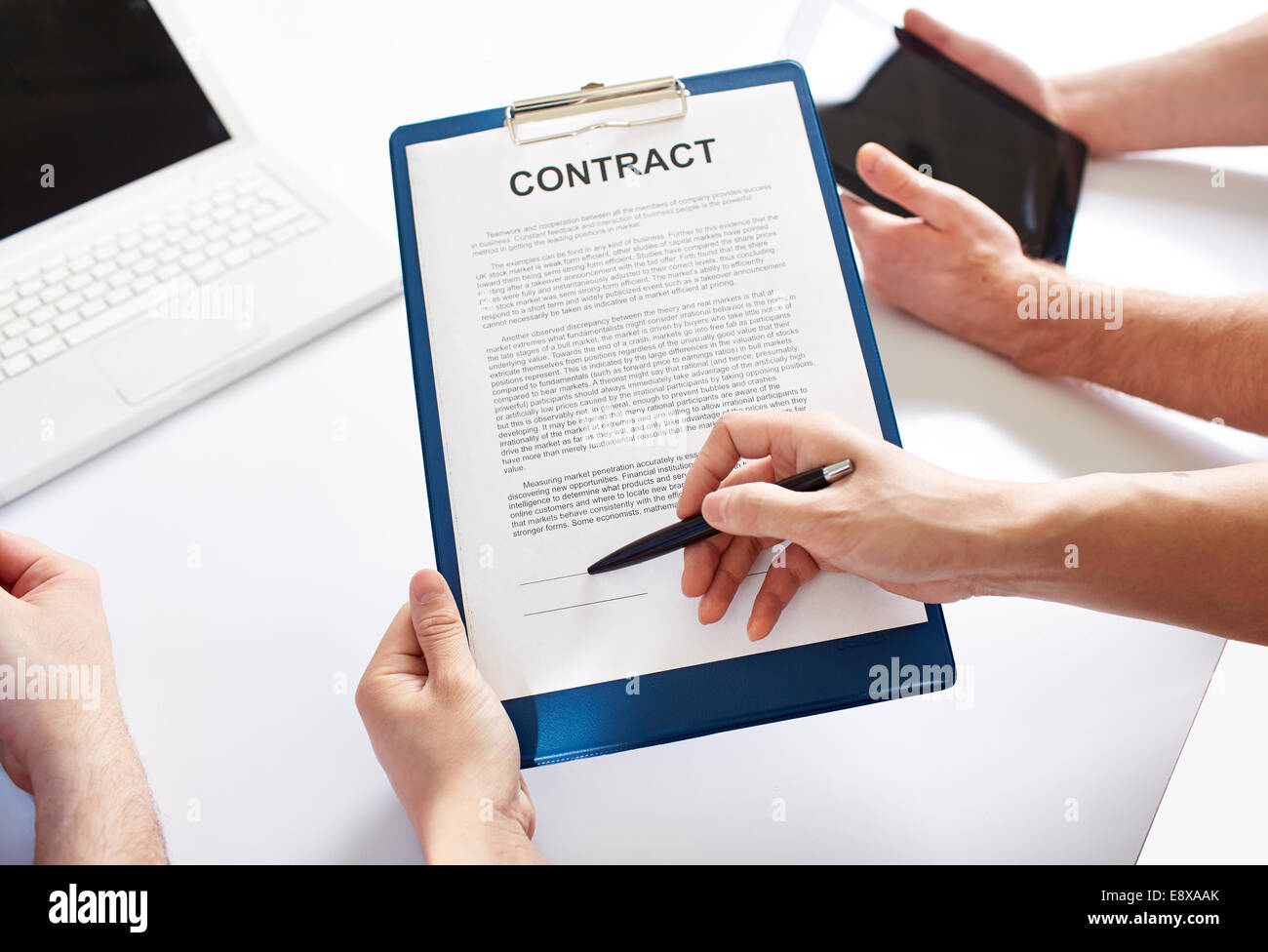 Hands holding a business contract Stock Photo - Alamy