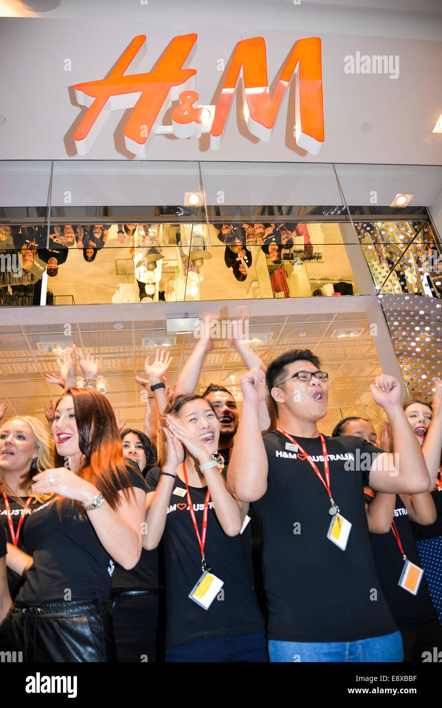 Sydney, Australia. 16th October, 2014. H&M staff get excited before the ...