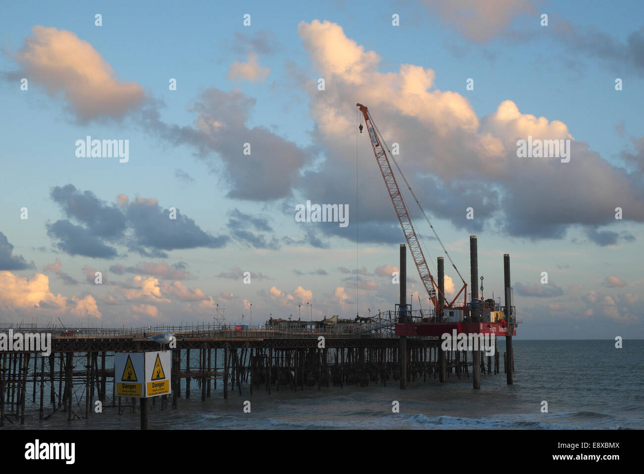 Jack up crane and barge to access the end of Hastings pier to dismantle ...
