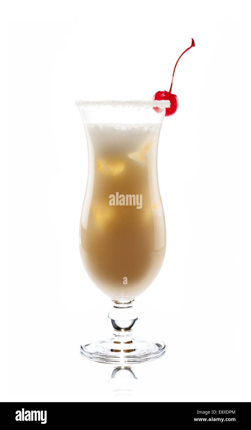 white alcoholic milk cocktail with red cherries and sugar in a glass ...