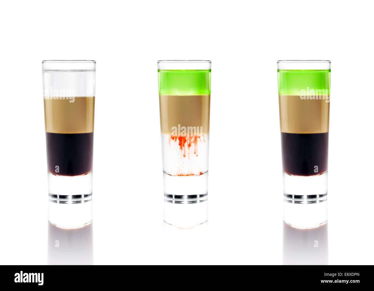 three-layer and three-color shot of an alcoholic drink Stock Photo - Alamy