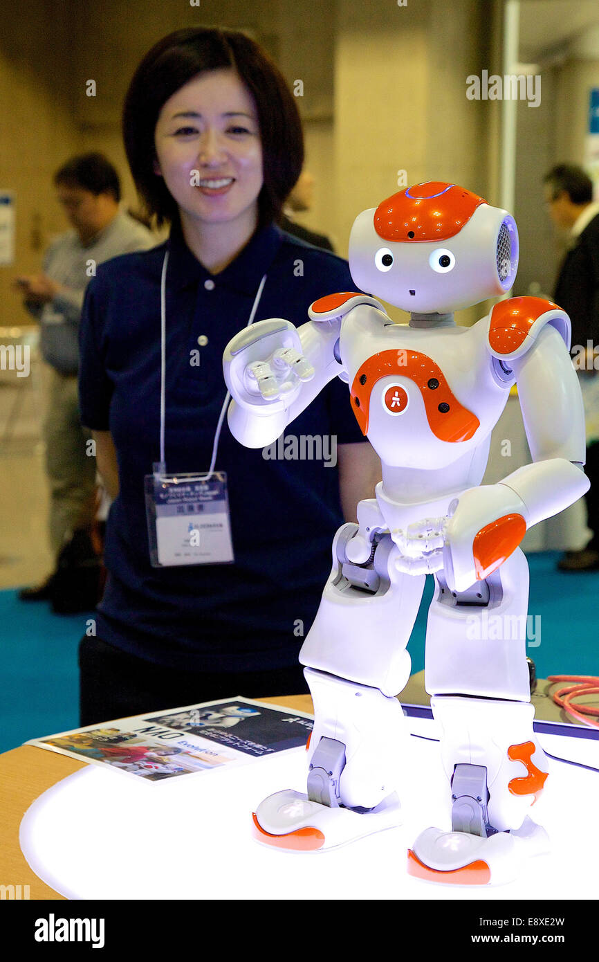 Tokyo, Japan. 16th October, 2014. The robot "NAO" performs and responds ...
