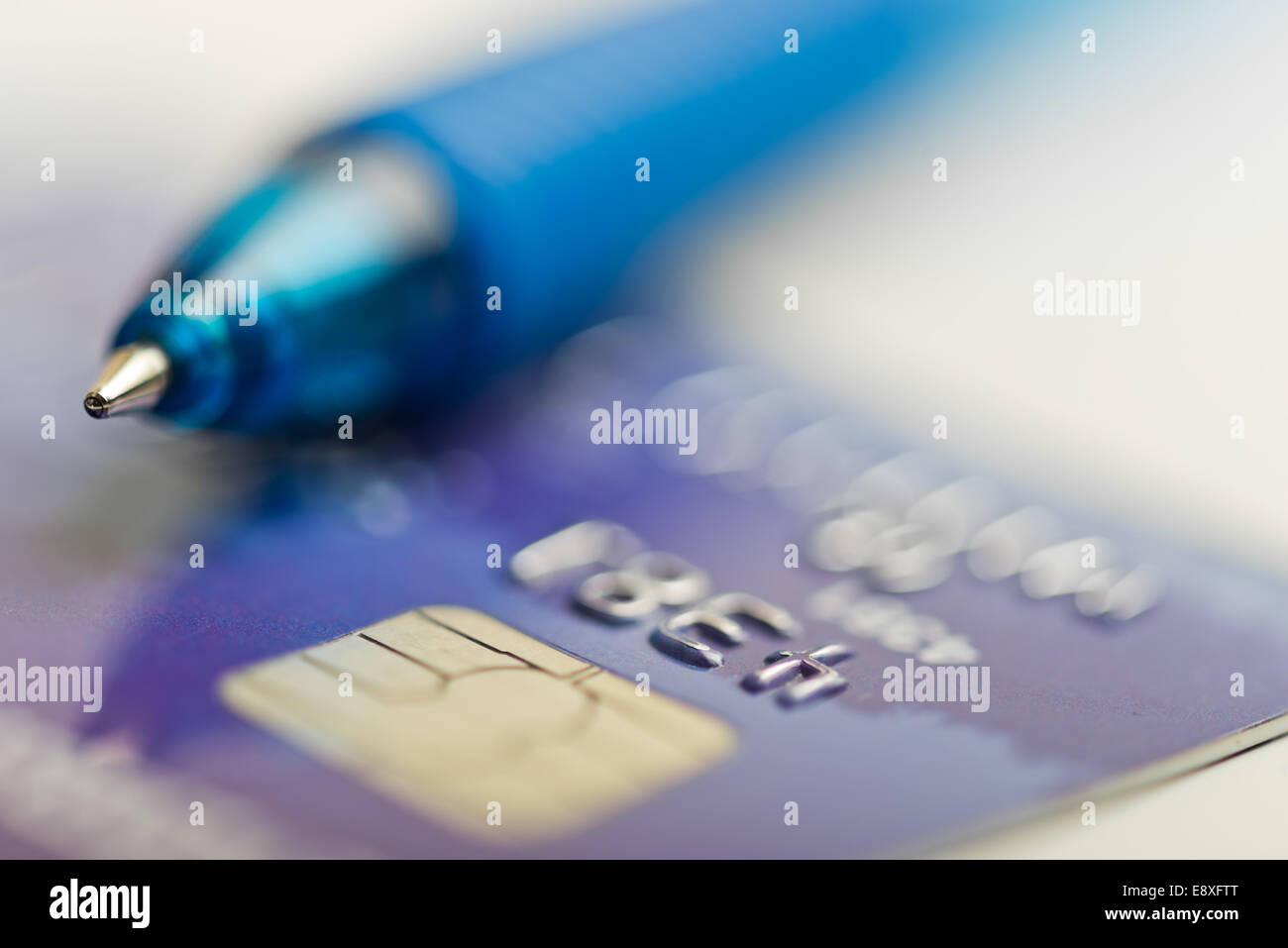 Credit card and pen Stock Photo - Alamy