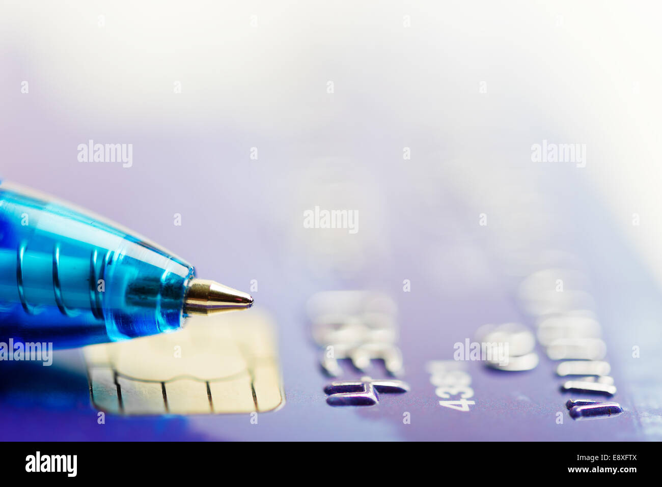 Credit card and pen Stock Photo - Alamy
