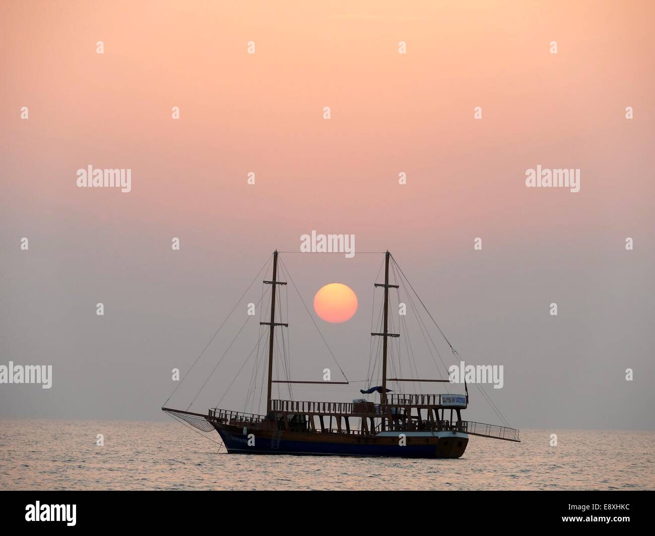 Ship at sunset Stock Photo - Alamy