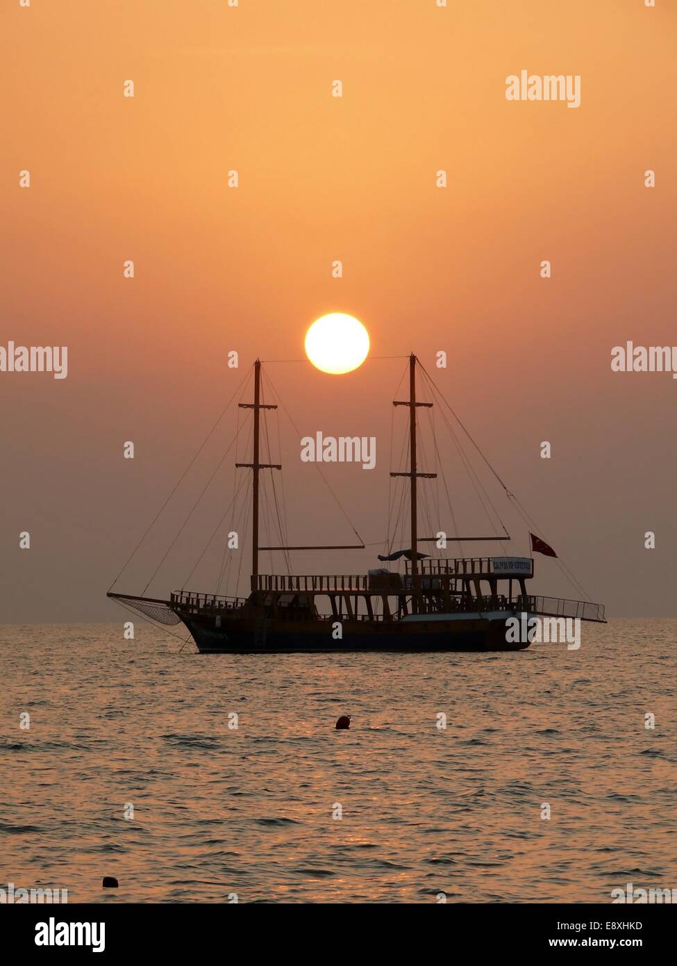 Ship at sunset Stock Photo - Alamy