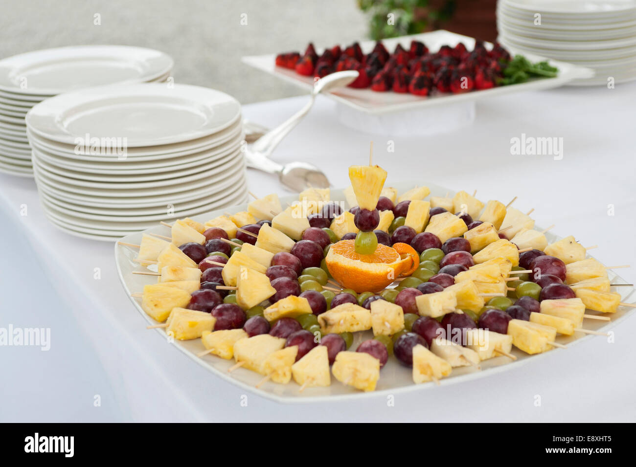 buffet table with fruit skewers Stock Photo - Alamy