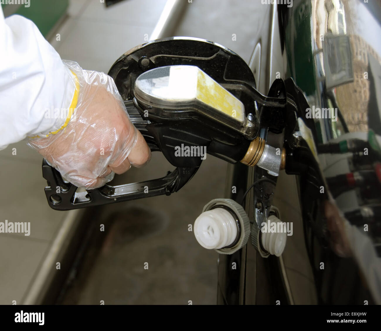 Pouring petroleum hi-res stock photography and images - Alamy