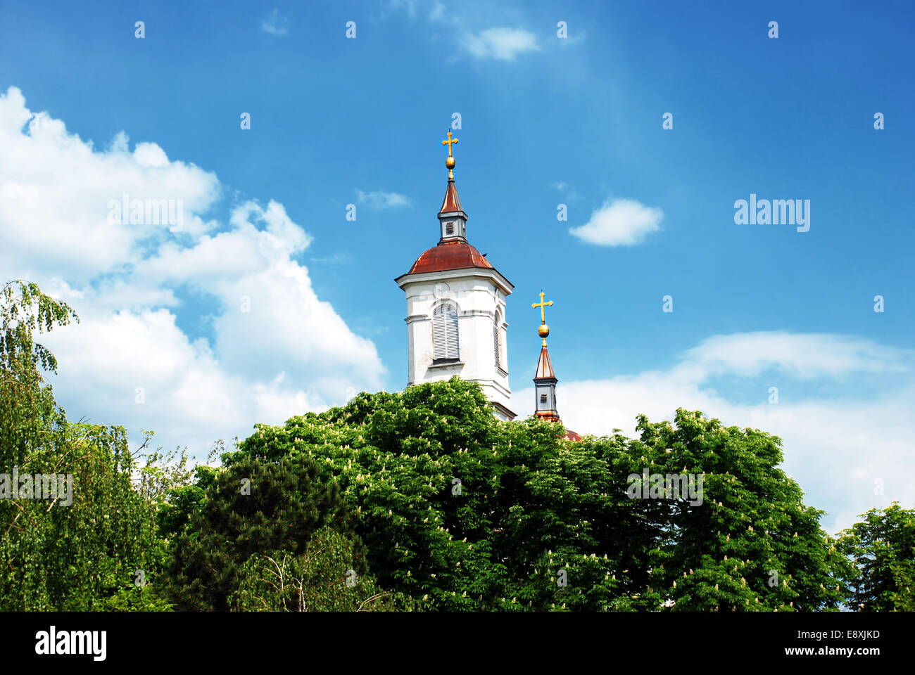 Church top over blue sky Stock Photo - Alamy