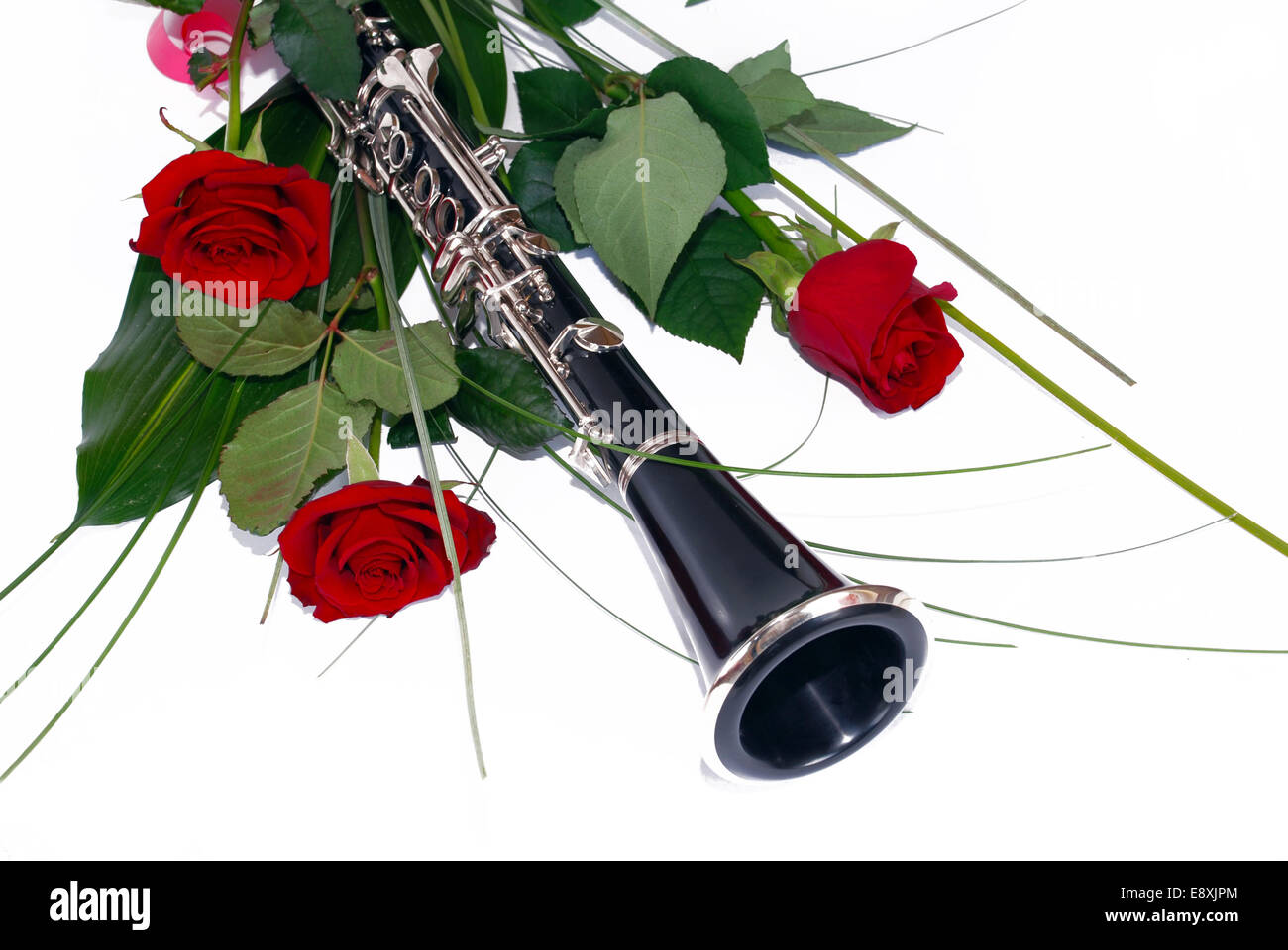 Red roses and clarinet Stock Photo - Alamy