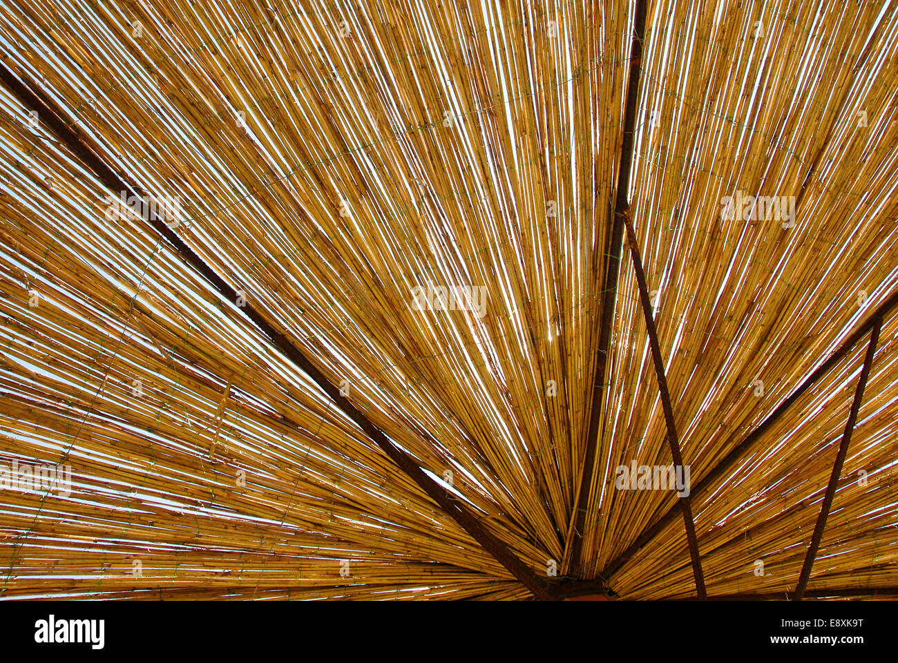 Straw umbrella texture Stock Photo - Alamy