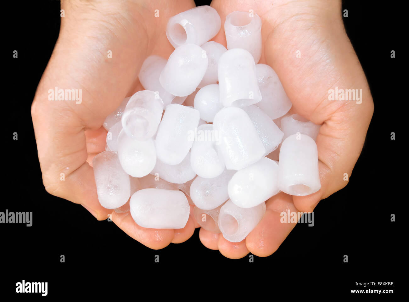 Ice in hand Stock Photo - Alamy
