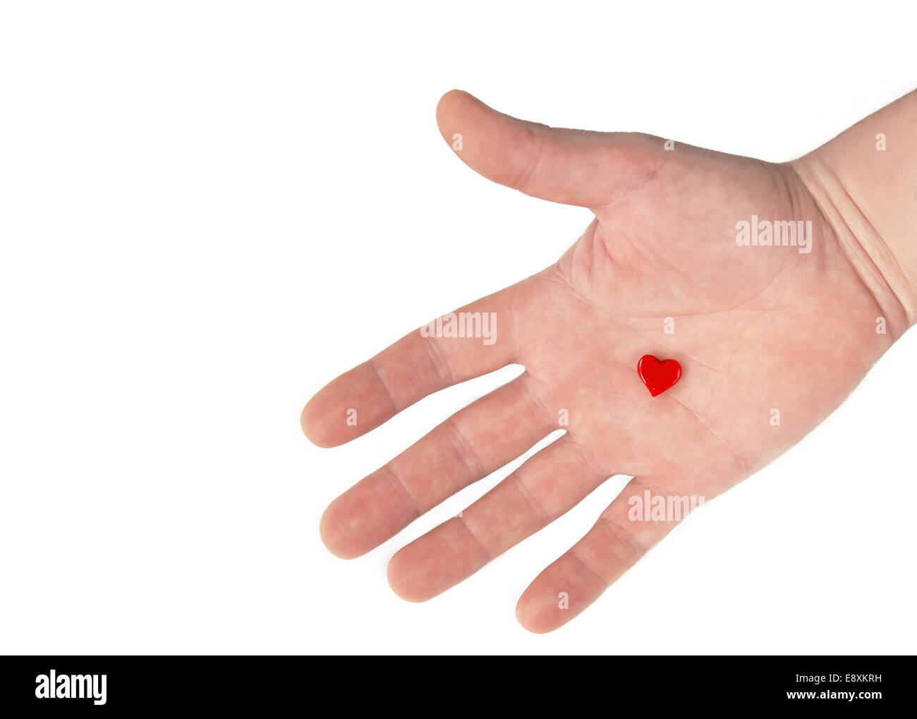 Heart on hand Stock Photo - Alamy