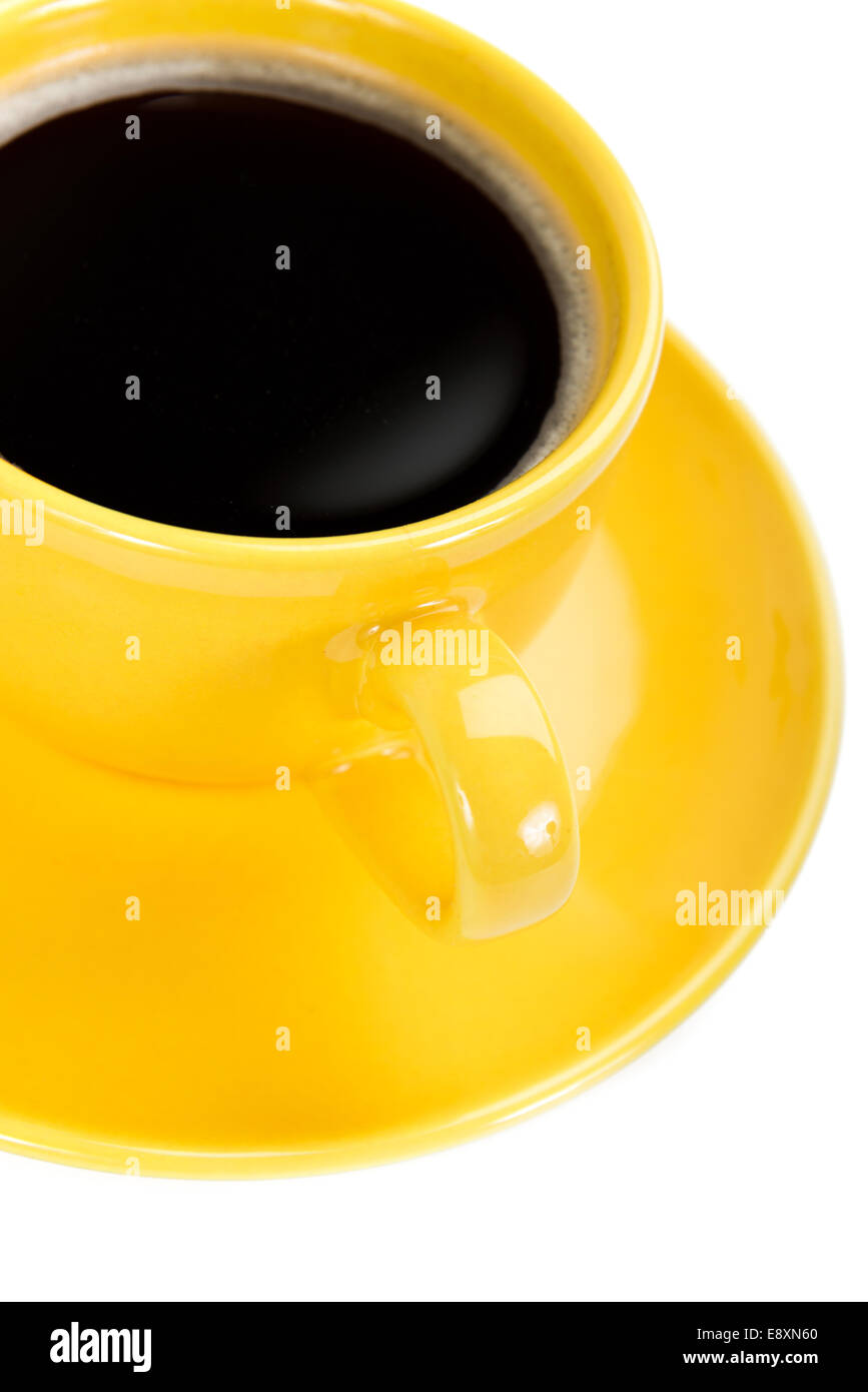 Coffee in an yellow cup Stock Photo - Alamy