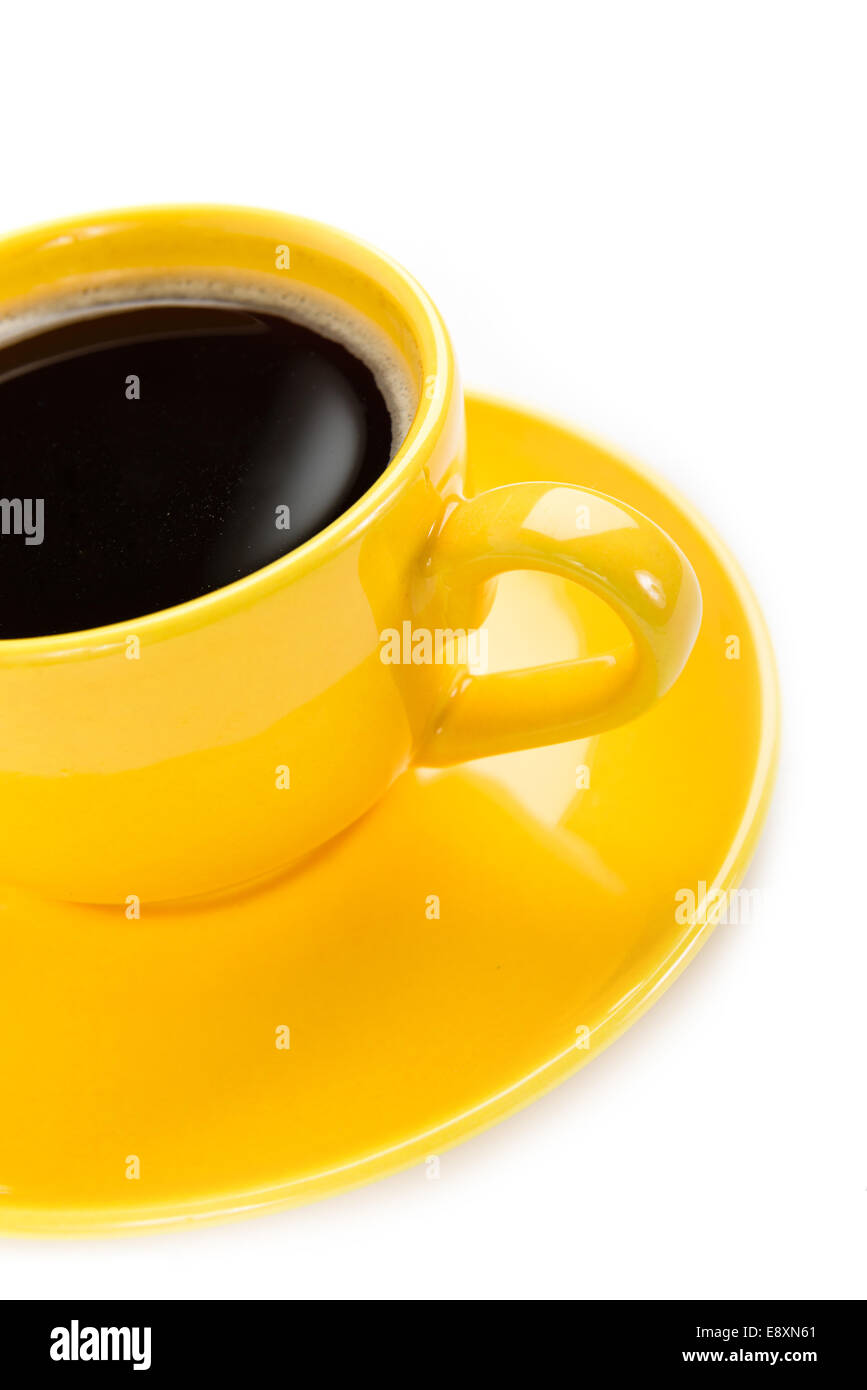 Coffee in an yellow cup Stock Photo - Alamy