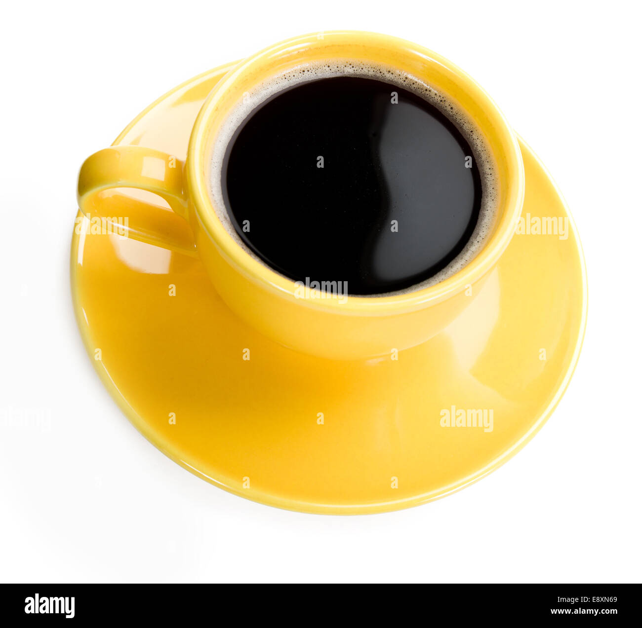 Coffee in an yellow cup Stock Photo - Alamy