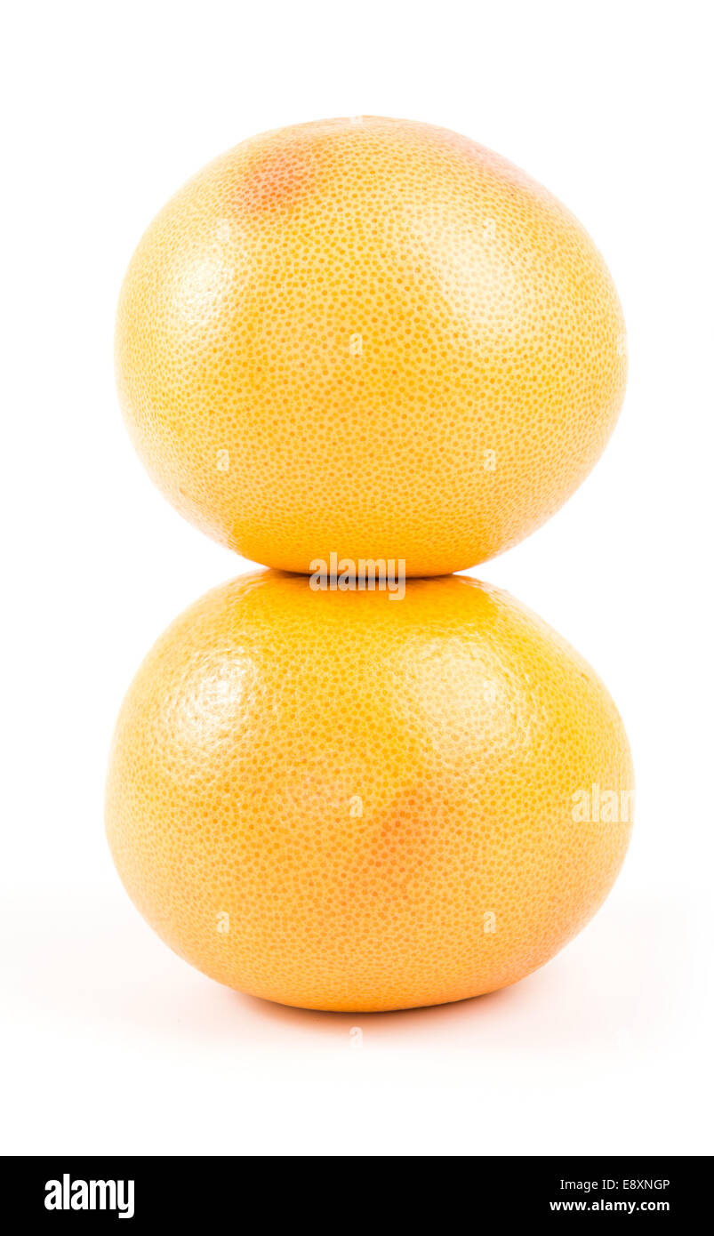 two fresh grapefruits on white background Stock Photo - Alamy