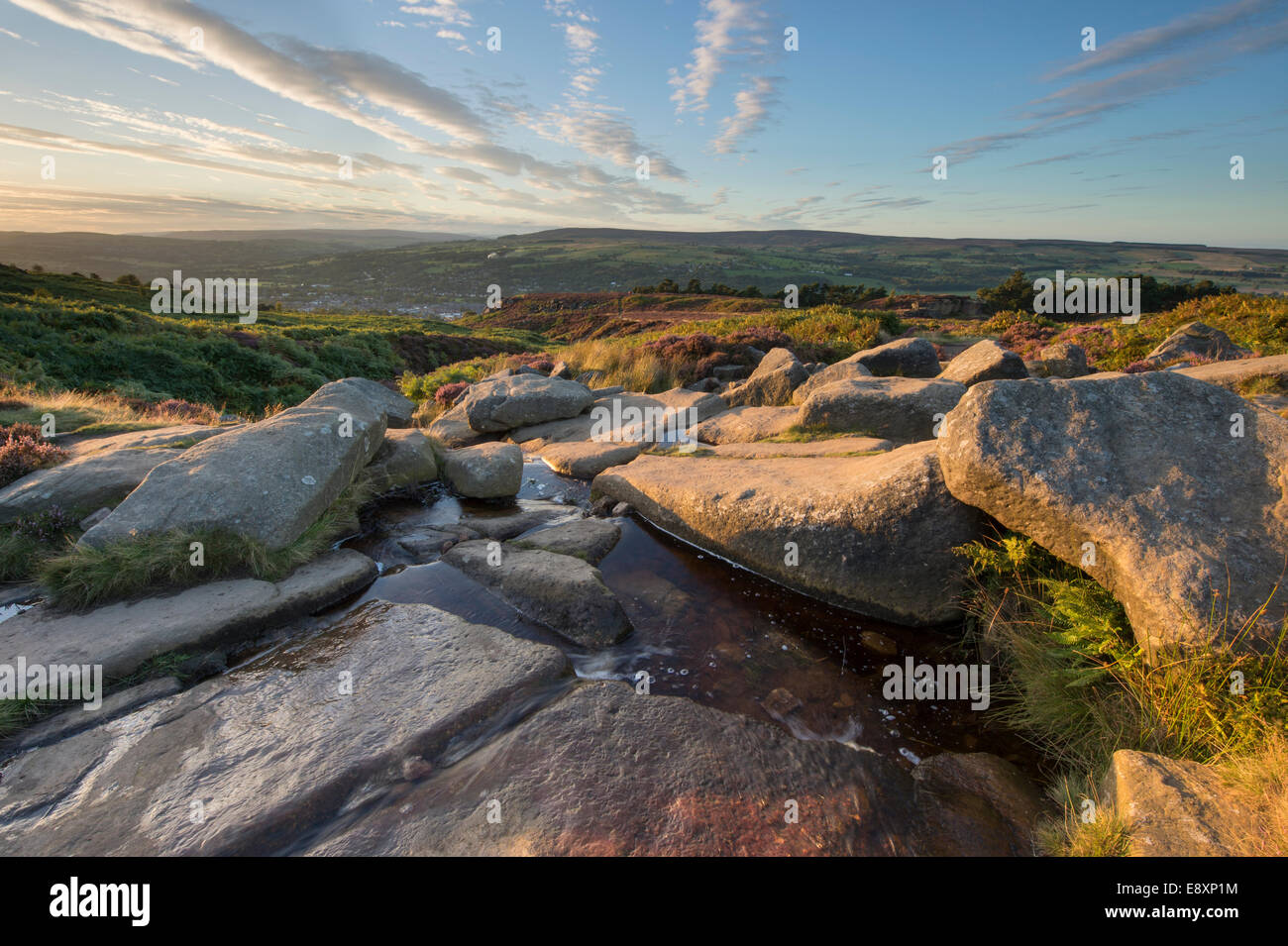 Moor sundown sun countryside rocks rocky blue sky clouds hi-res stock ...