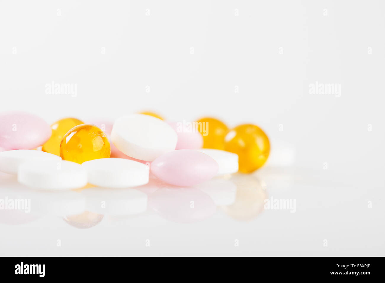 Colorful tablets with capsules Stock Photo - Alamy