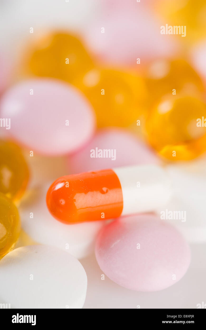 Colorful tablets with capsules Stock Photo - Alamy