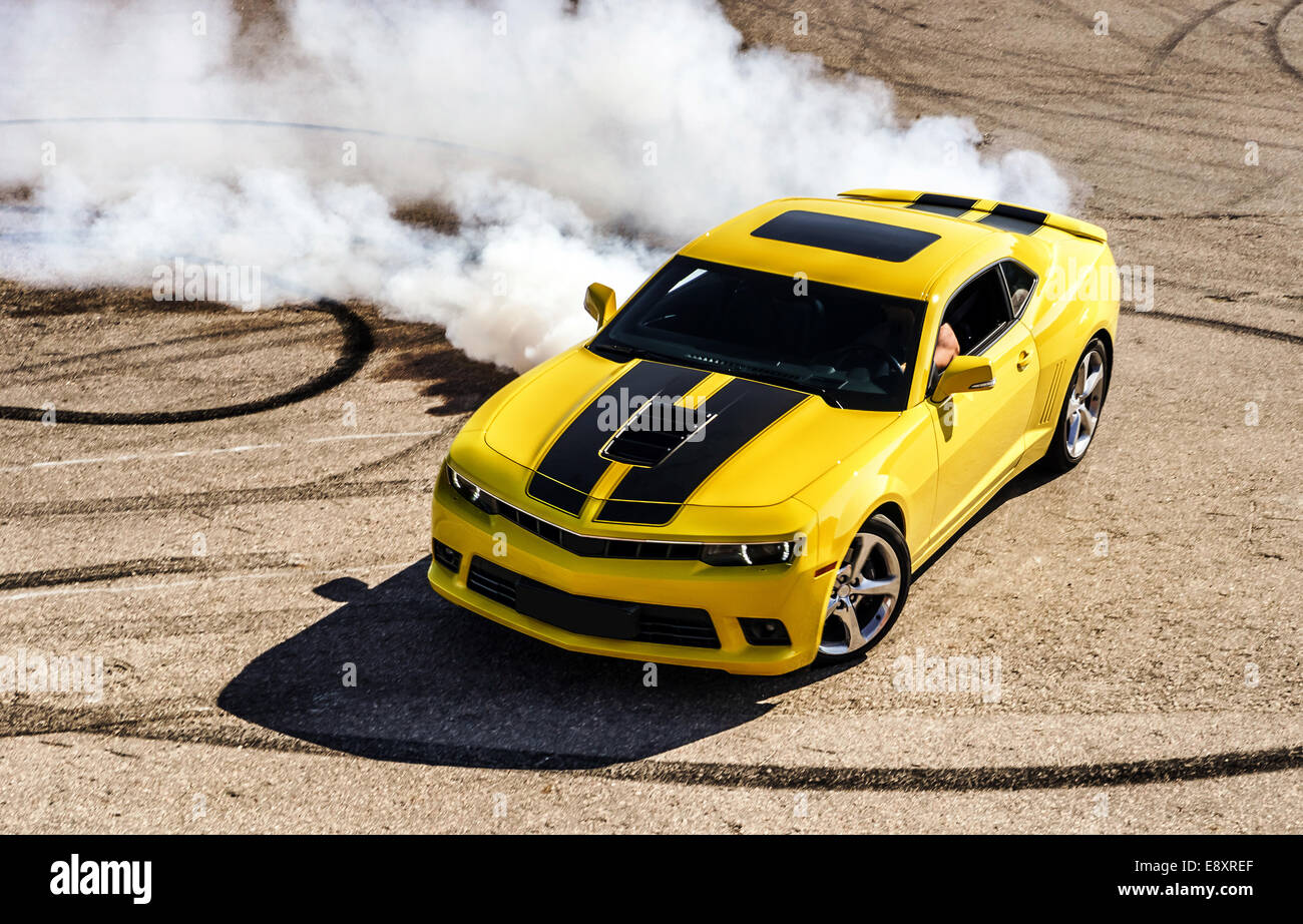 Luxury yellow sport car drifting, motion capture Stock Photo - Alamy