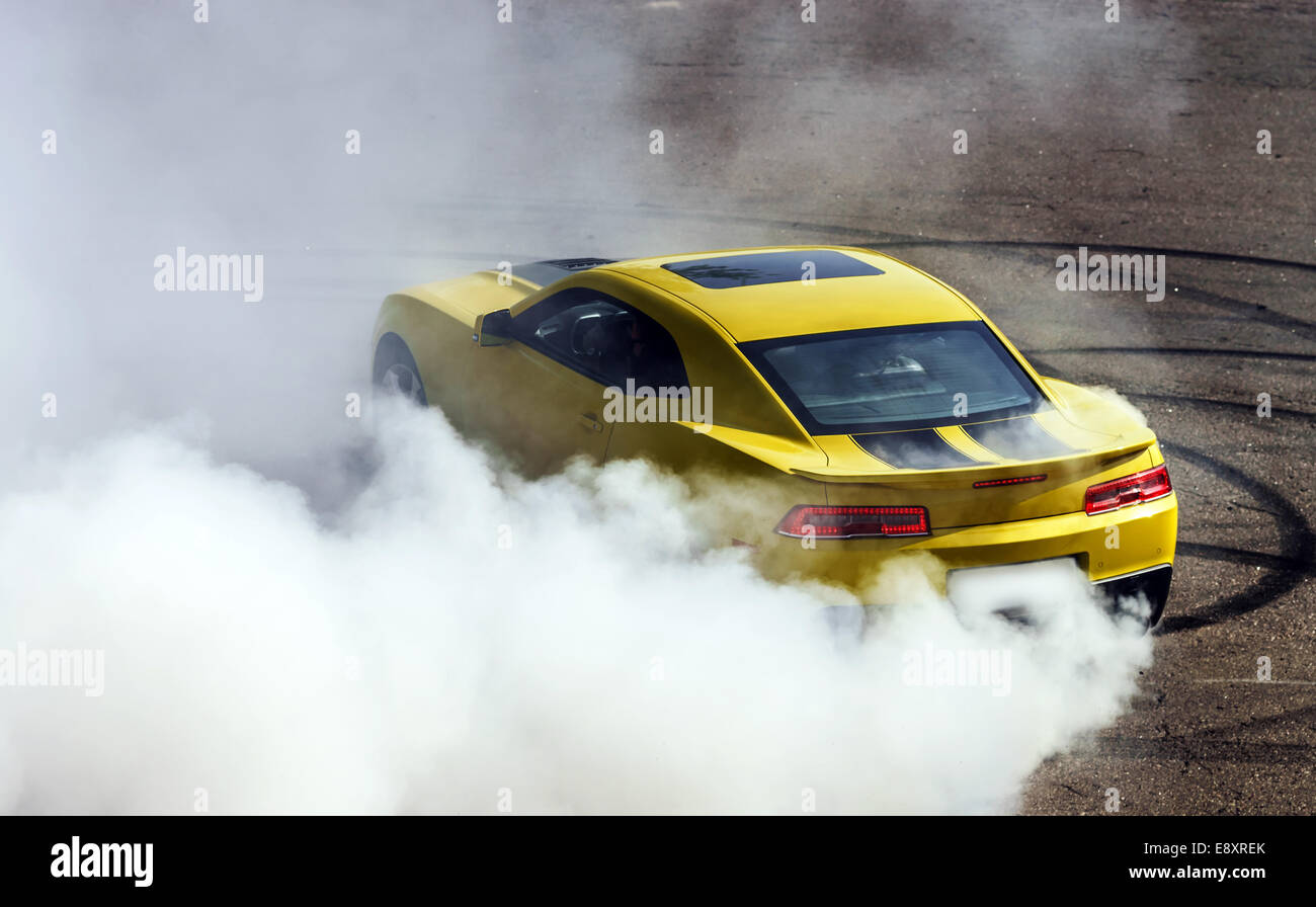 Luxury yellow sport car drifting, motion capture Stock Photo - Alamy