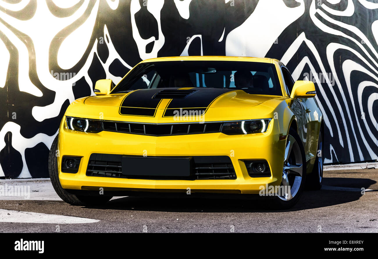 Luxury sport yellow car. Speed and modern style Stock Photo - Alamy