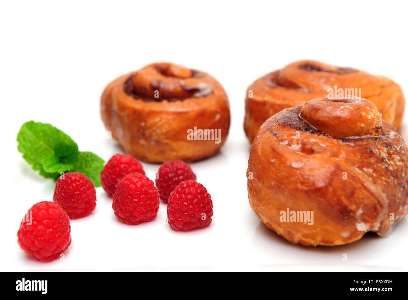Raspberry and Cinnamon Rolls Stock Photo - Alamy