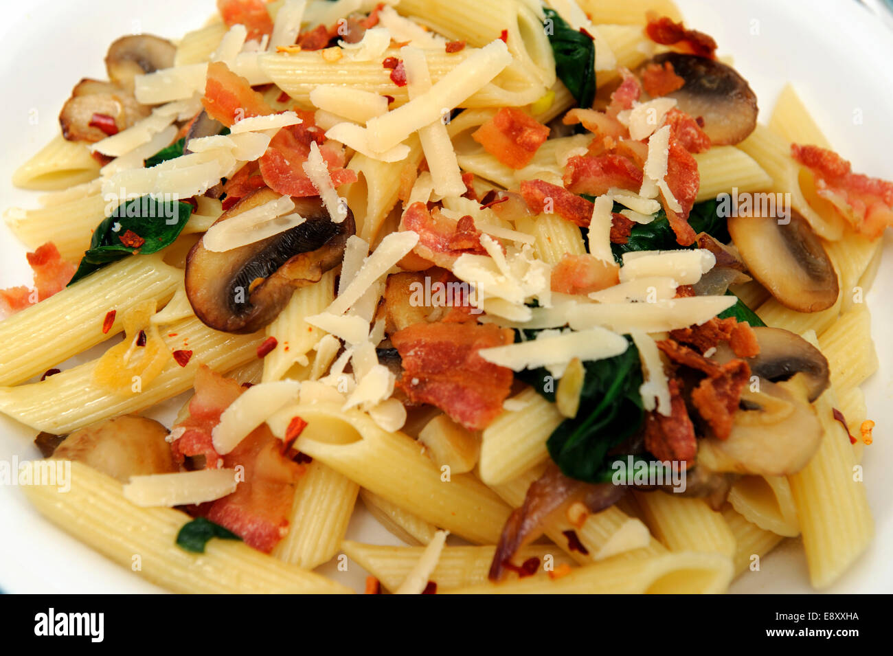 Penne Pasta And Saut├⌐ed Spinach Stock Photo - Alamy