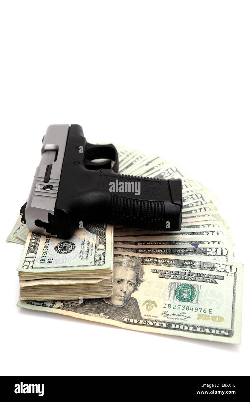 Gun And Money Stock Photo - Alamy