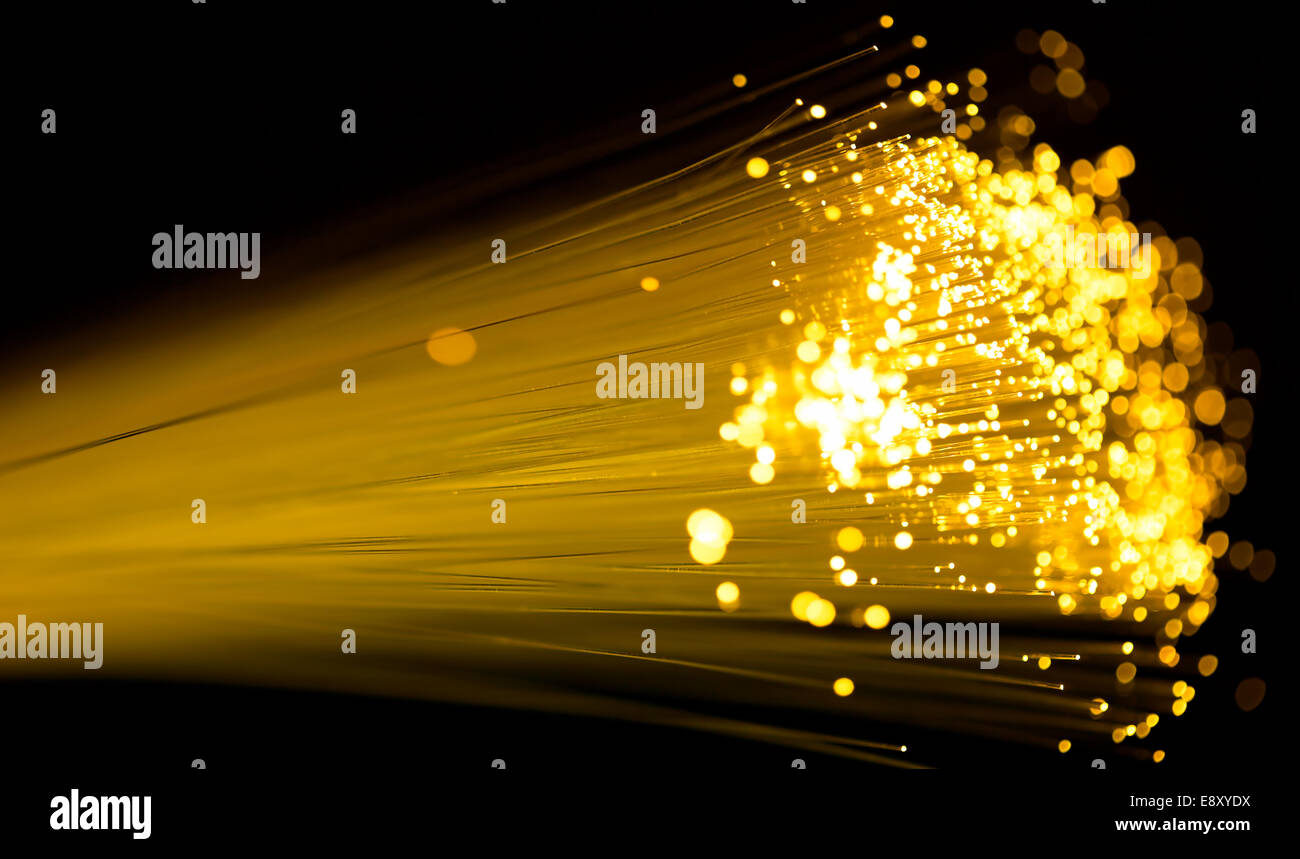 yellow fiber optics cable close up shot Stock Photo - Alamy
