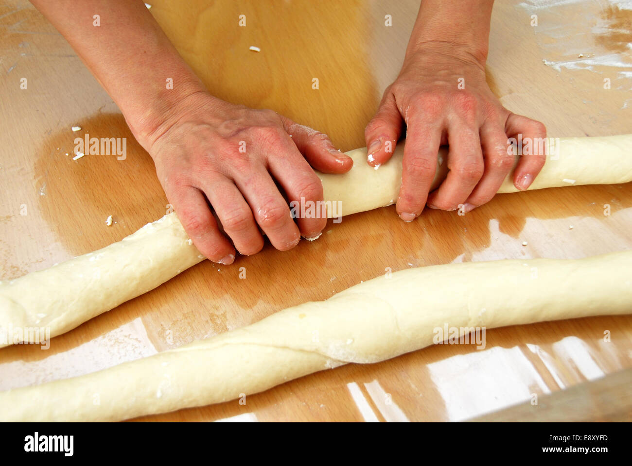Preparing rolled pastry Stock Photo - Alamy