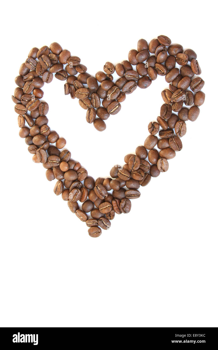 Heart shaped coffee beans. Isolated on white Stock Photo - Alamy