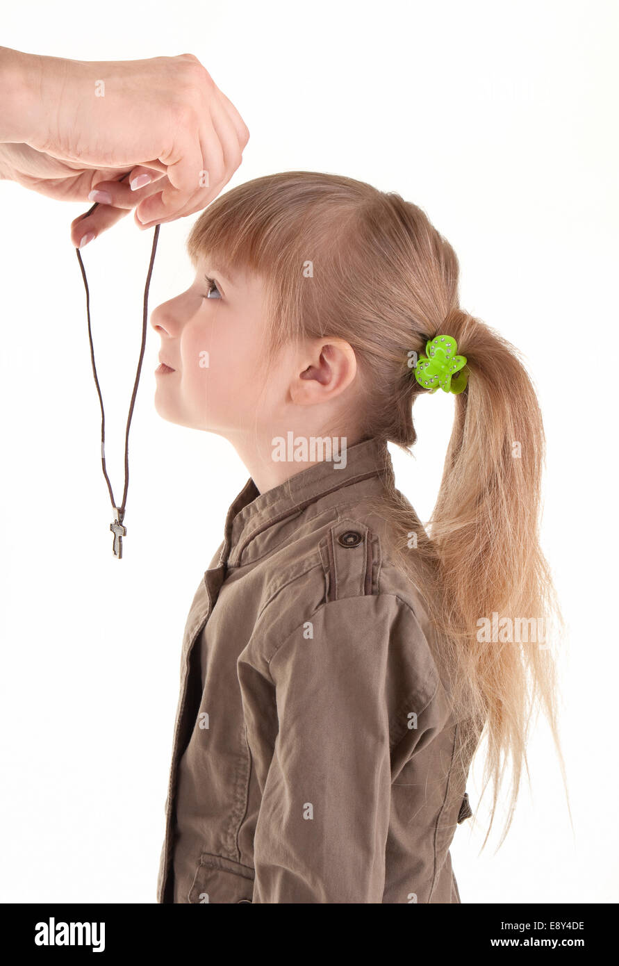Girl with crucifix hi-res stock photography and images - Alamy