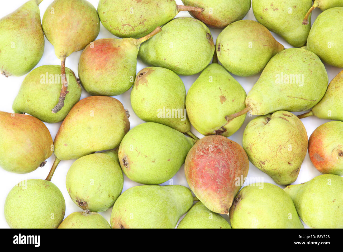 Organic sweet pears. Isolated on white Stock Photo - Alamy